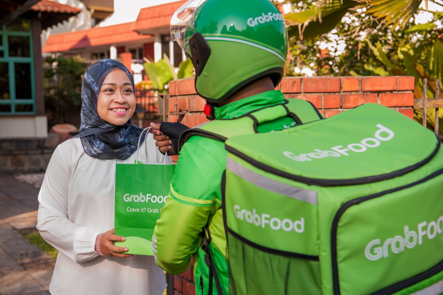 Grab wujudkan dua tabung khas untuk bantu pemandu dan penghantarnya ...